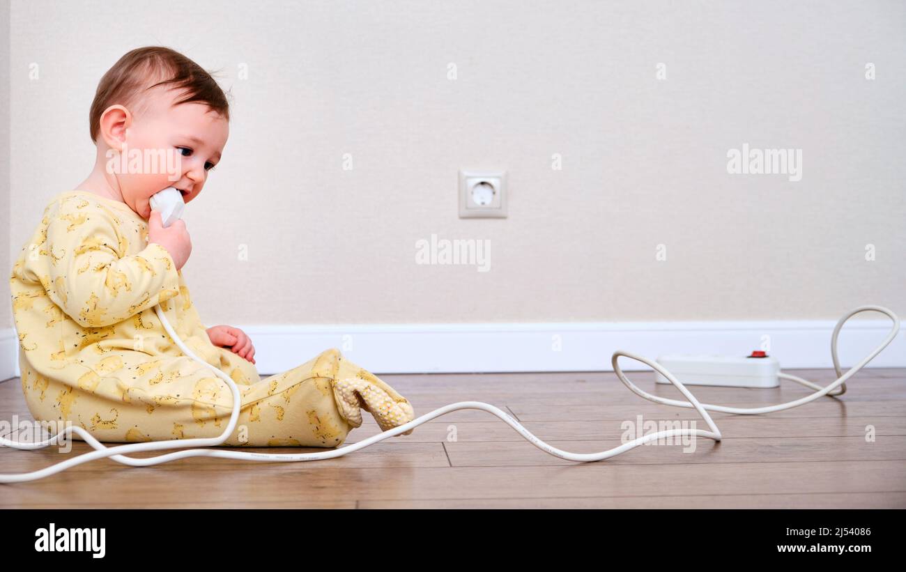 Baby boy playing cable wire hi-res stock photography and images - Alamy