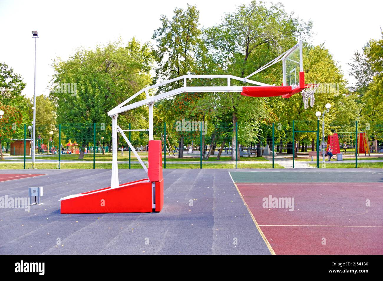 Basketball and football sports grounds with equipment Stock Photo - Alamy