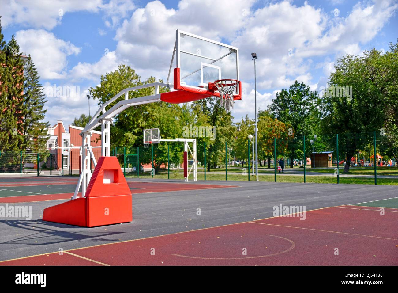 Basketball and football sports grounds with equipment Stock Photo - Alamy