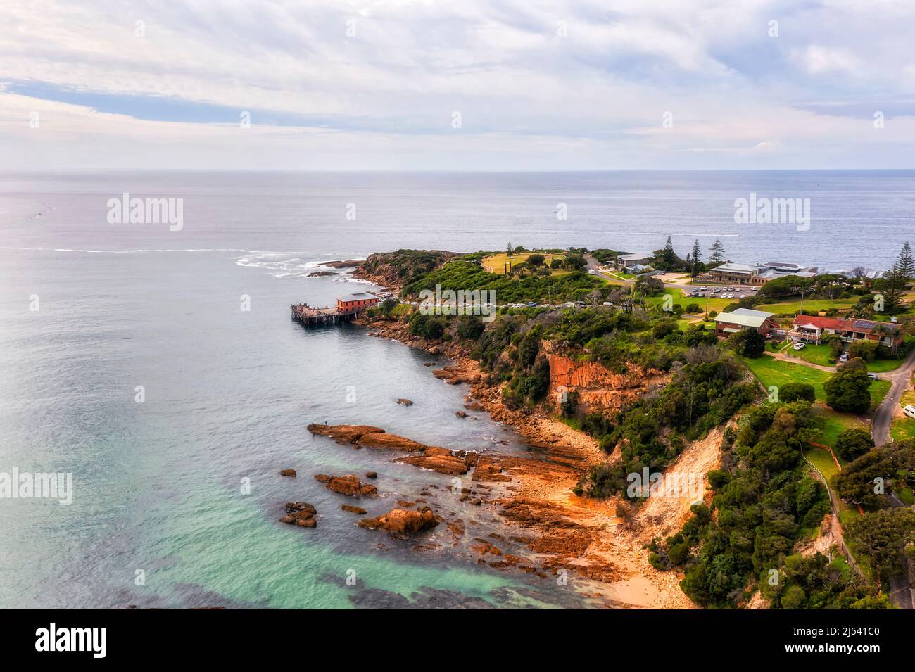 Headland of Tathra town and beach on Sapphire coast of Australia with ...