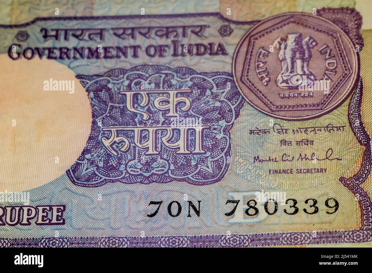 Old One Rupee notes combined on the table, India money on the rotating ...