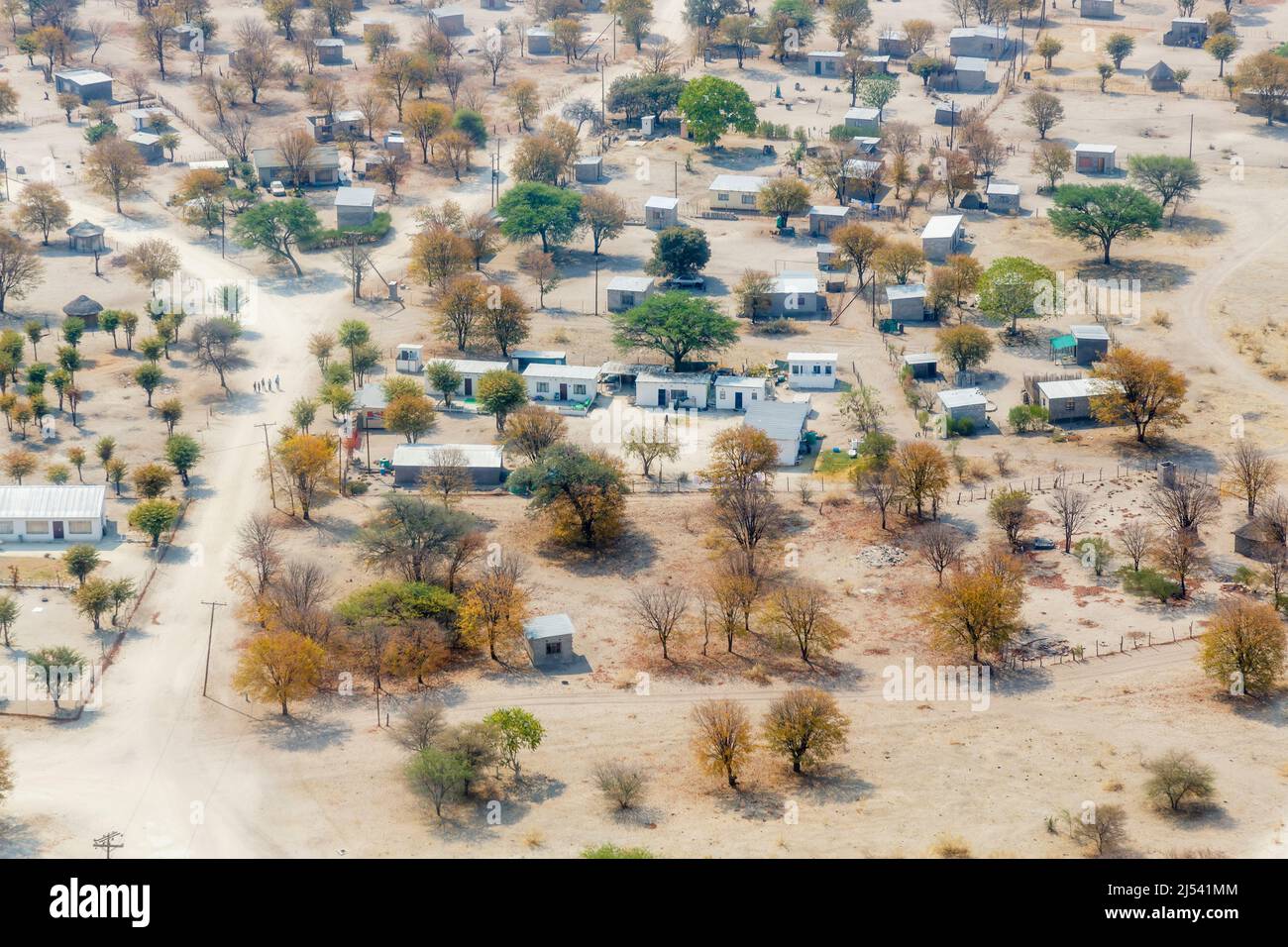 Aerial view over a small township en route to Moremi Game Reserve on a ...