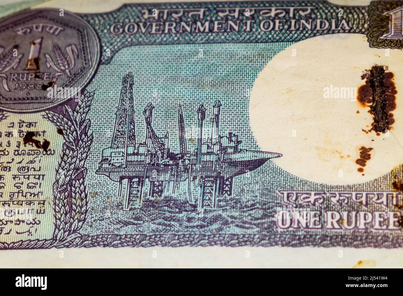Old One Rupee notes combined on the table, India money on the rotating ...