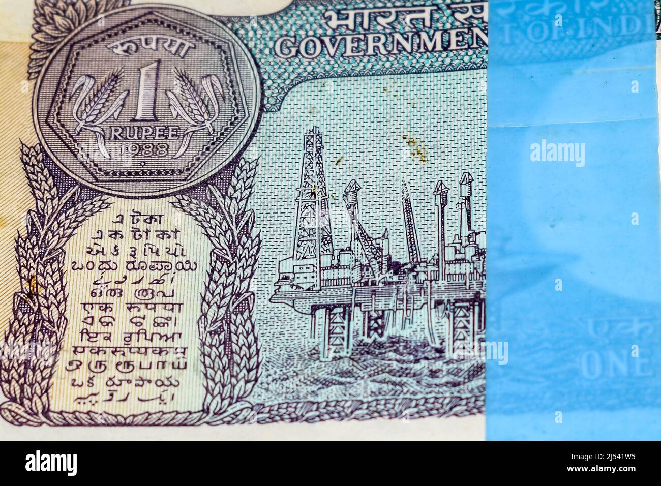 Old One Rupee notes combined on the table, India money on the rotating ...