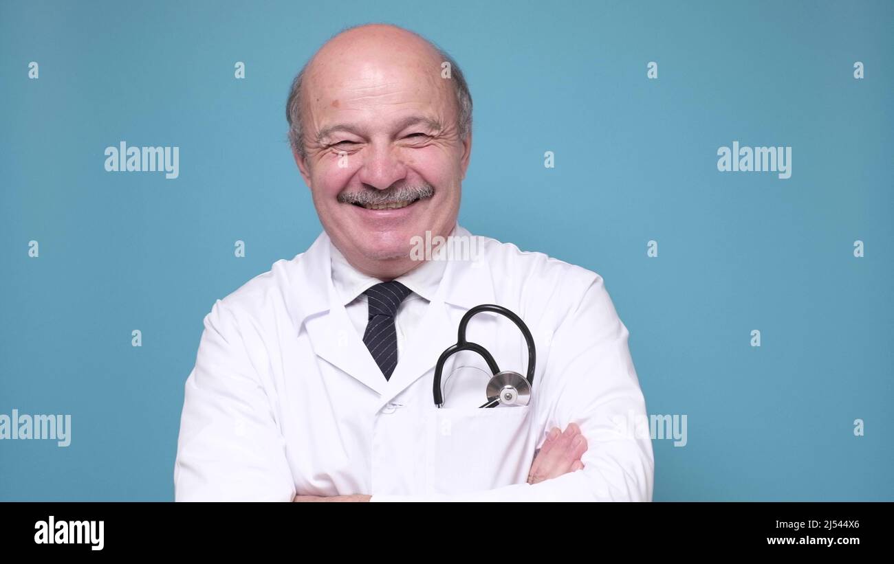 Senior doctor laughing on funny hi-res stock photography and images - Alamy