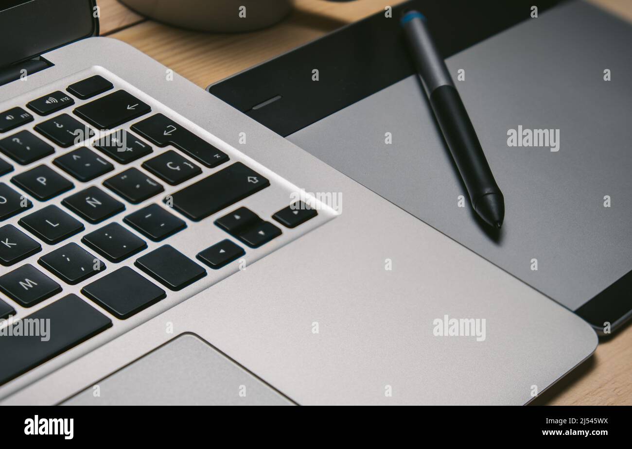 Graphic tablet and pencil on office desk. Tool design graphic Stock ...