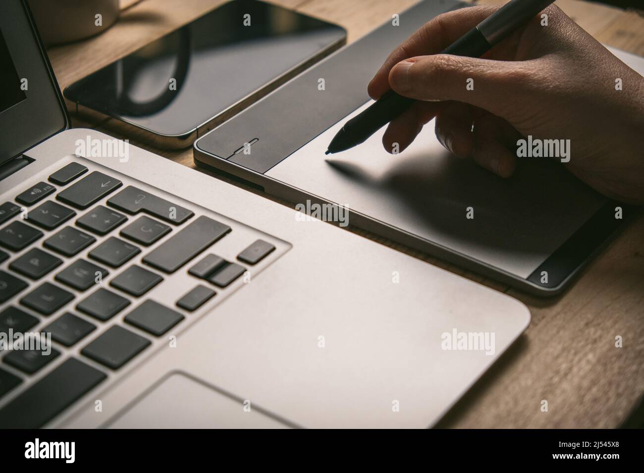 Graphic Designer working with interactive pen display, digital Drawing ...