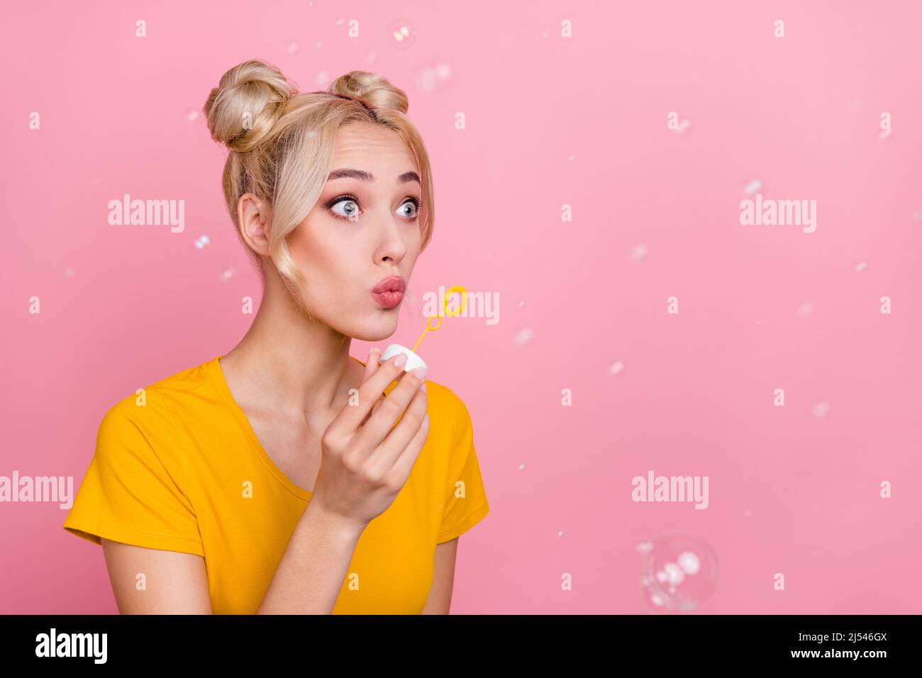 Photo of sweet millennial blond lady blow bubble look promo wear trend ...