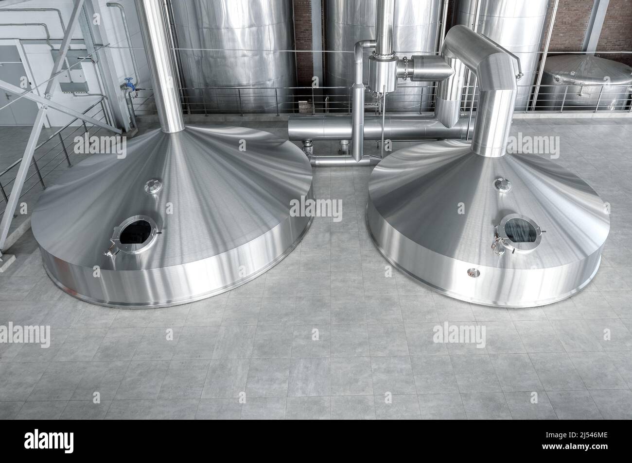Mash vats of a brewery. Large metal fermentation tanks Stock Photo - Alamy