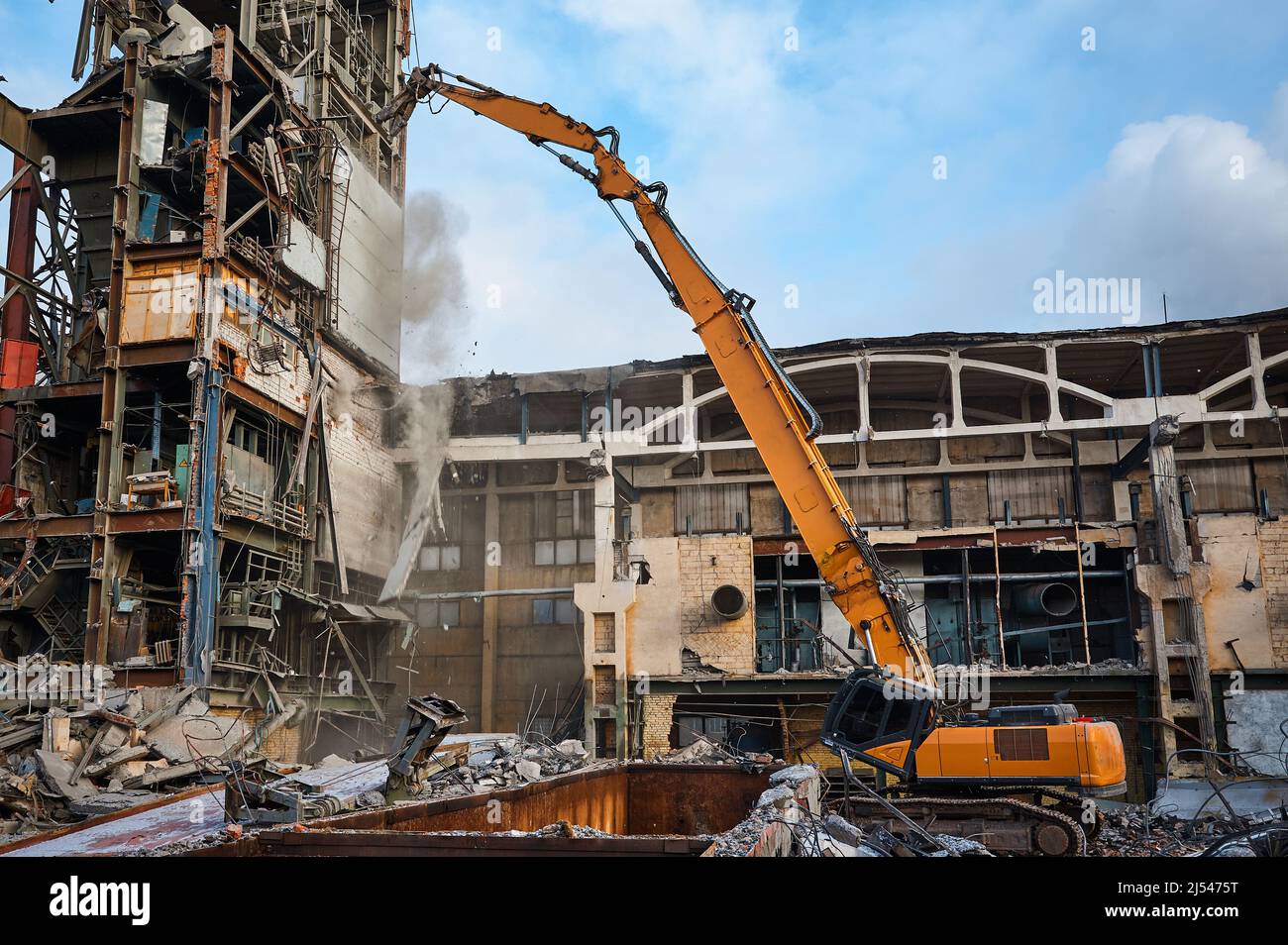 Destroying of old industrial building by excavator destroyer Stock ...