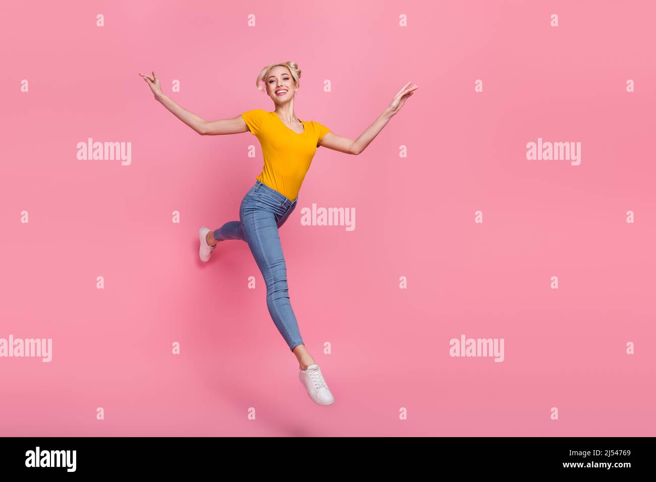 Full size photo of attractive girl jumping go walk enjoy spring weekend ...