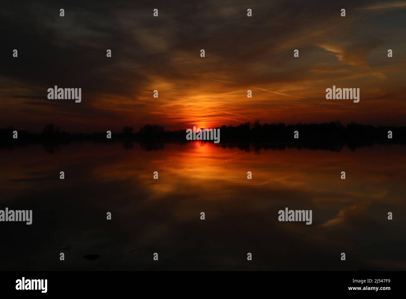 Spring lake sunset Stock Photo - Alamy