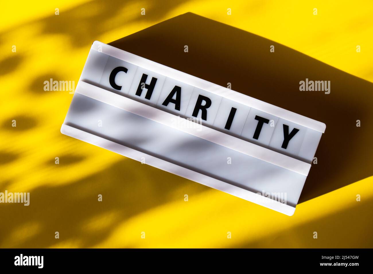 Lightbox with text CHARITY. Motivational Words Quotes Concept. Colorful ...