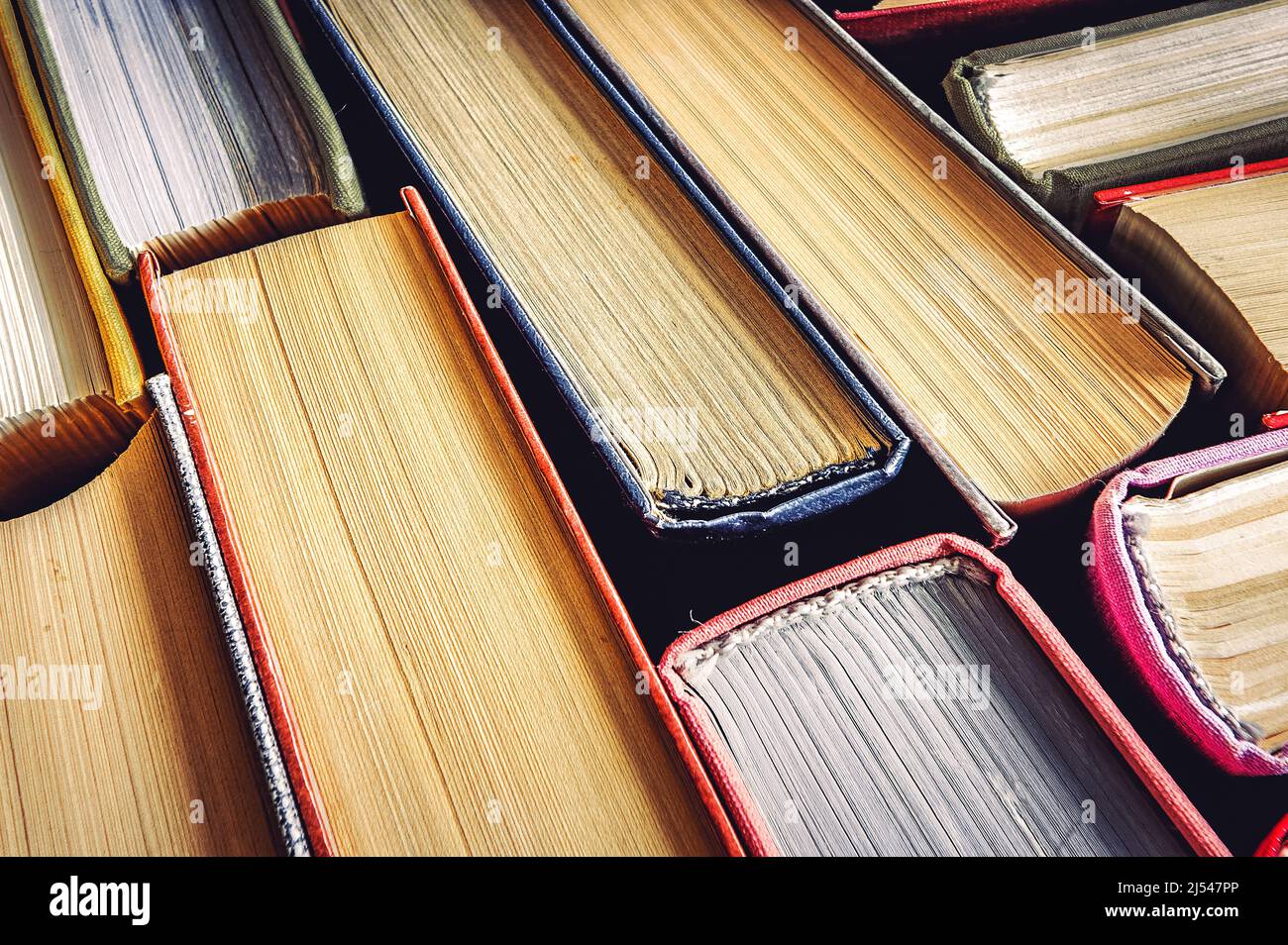 Books stacked. Stack of books background. many books piles. Close-up ...