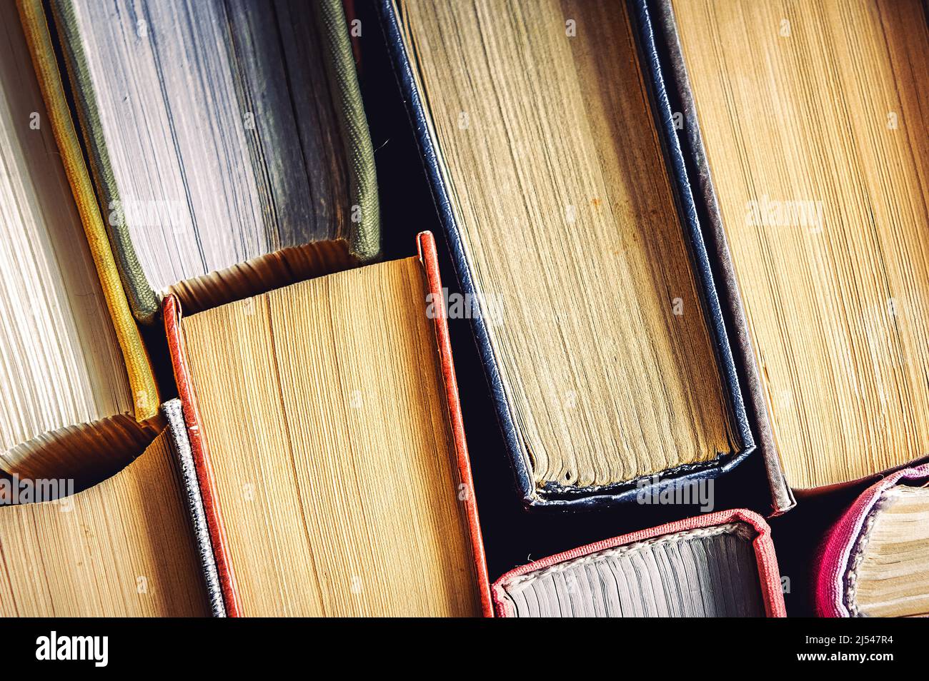 Books stacked. Stack of books background. many books piles. Close-up ...