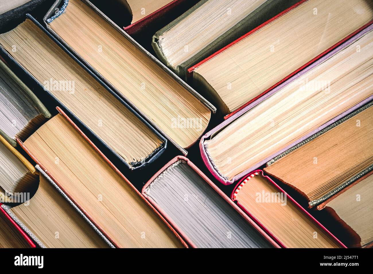 Books stacked. Stack of books background. many books piles. Close-up ...