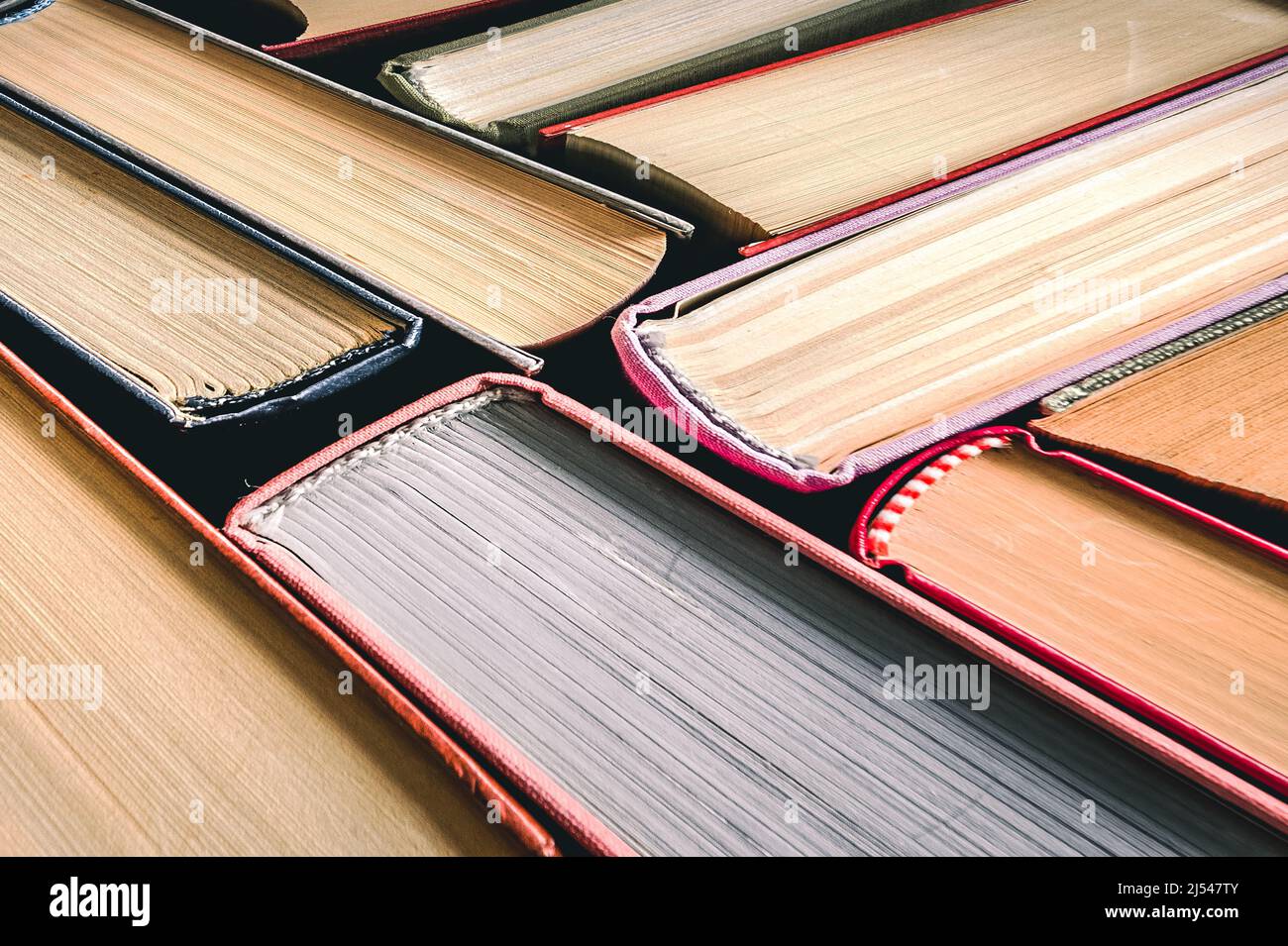 Books stacked. Stack of books background. many books piles. Close-up ...