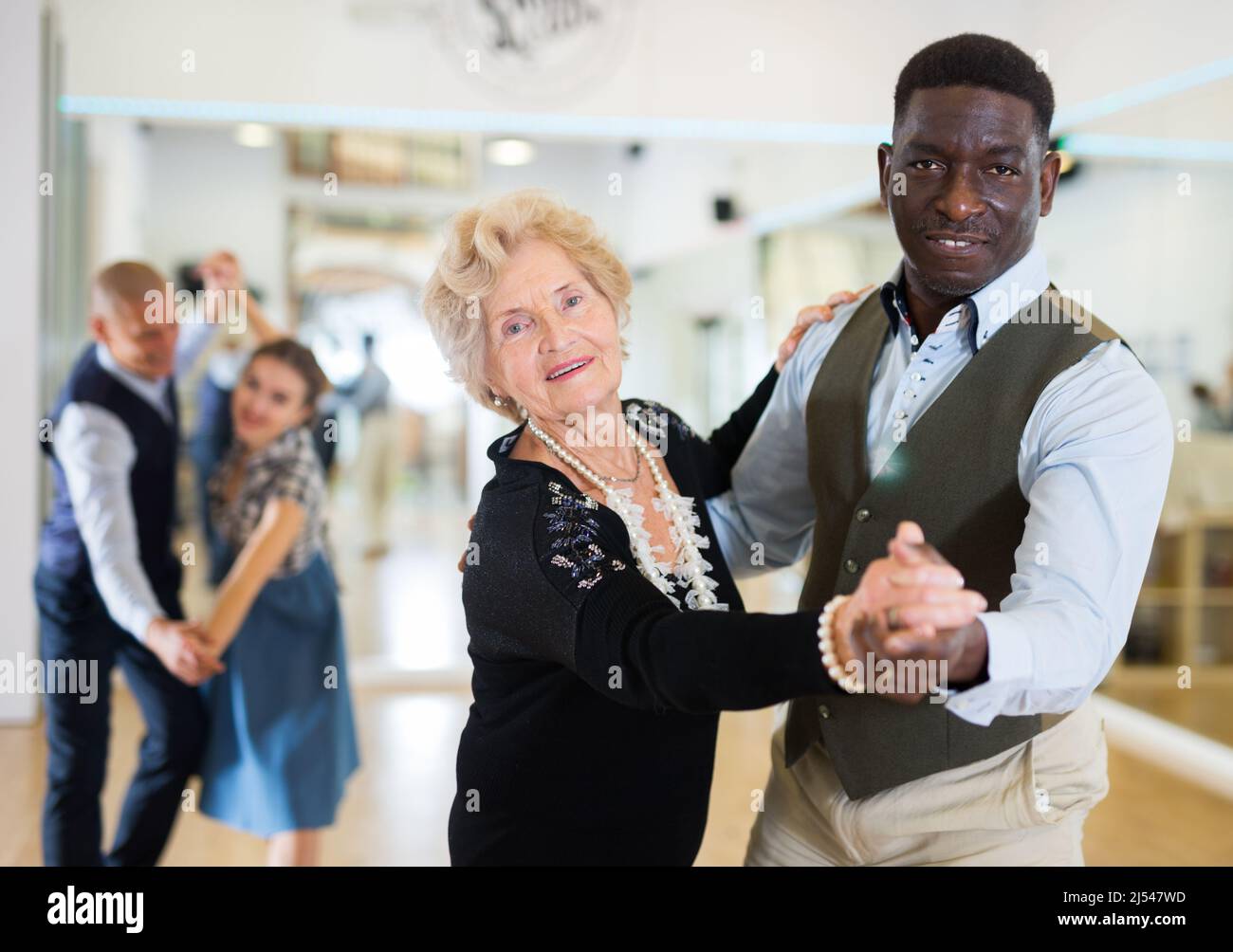 Dance couple practicing professional studio hi-res stock photography ...