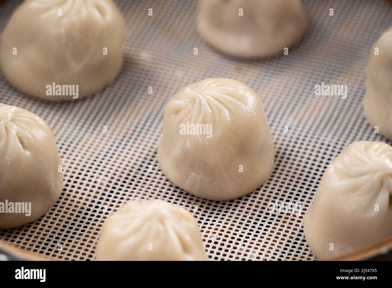 Steamed pork soup dumplings named Xiao long bao in Taiwan, Taiwanese ...