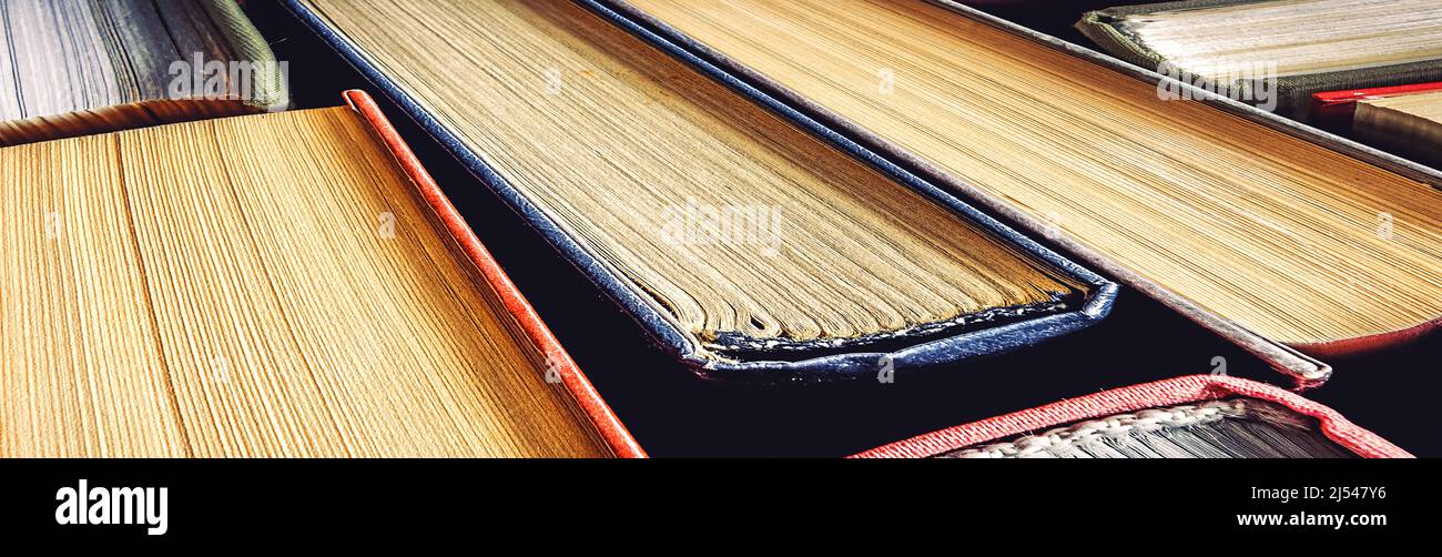 Banner of stacked books. Stack of books background. many books piles ...