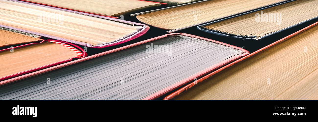 Banner of stacked books. Stack of books background. many books piles ...