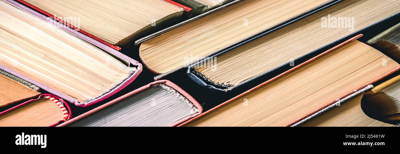 Banner of stacked books. Stack of books background. many books piles ...