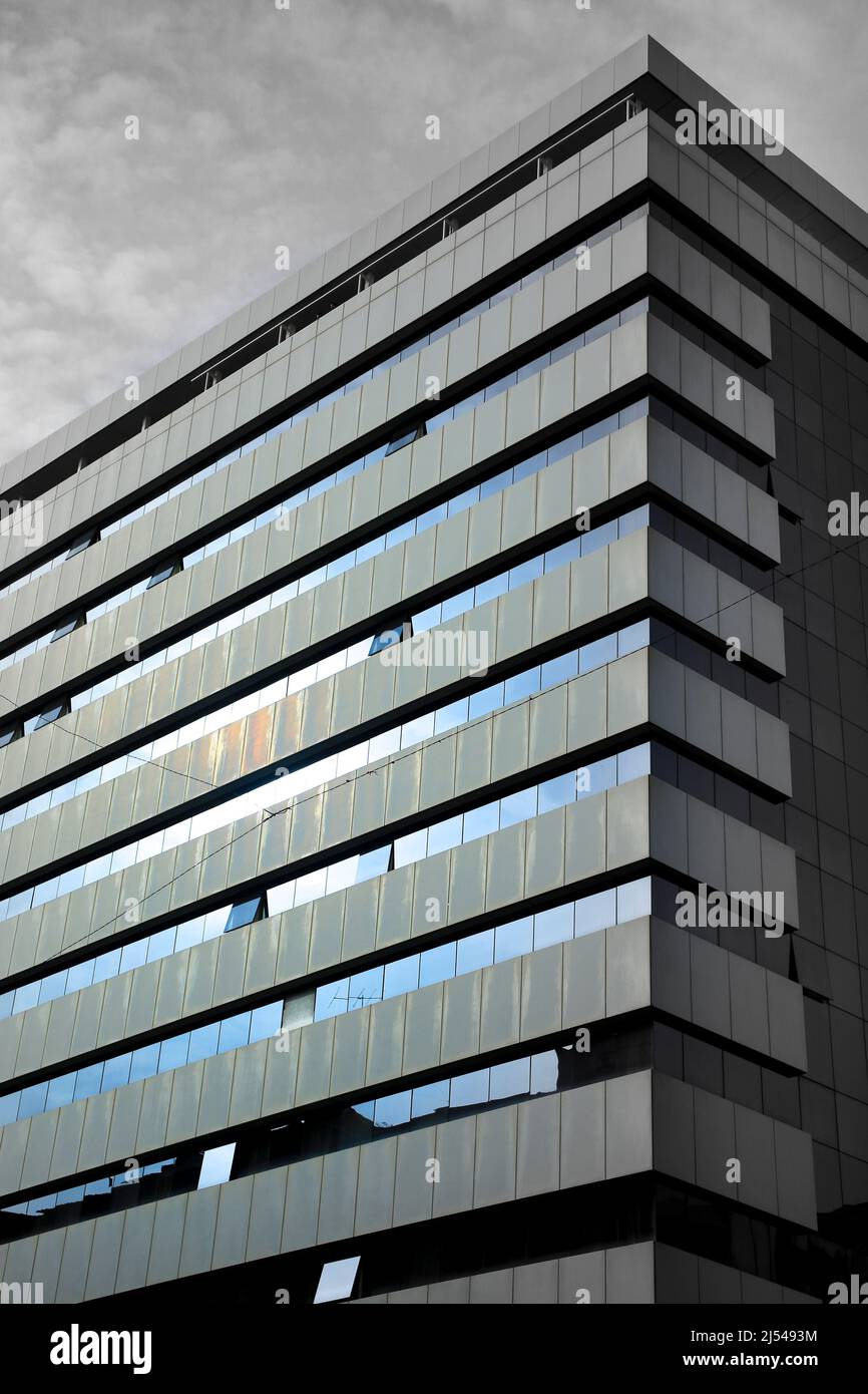 Rectilinear and geometric facade with glass windows Stock Photo - Alamy