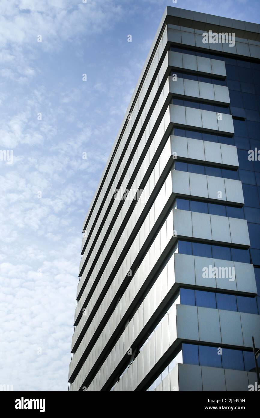Rectilinear and geometric facade with glass windows Stock Photo - Alamy