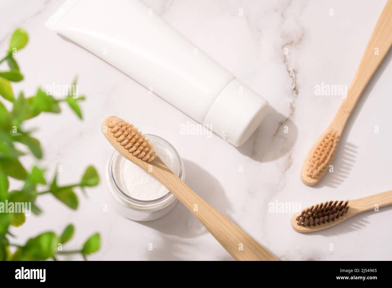 Top view on natural bamboo toothbrushes, mineral toothpowder and ...