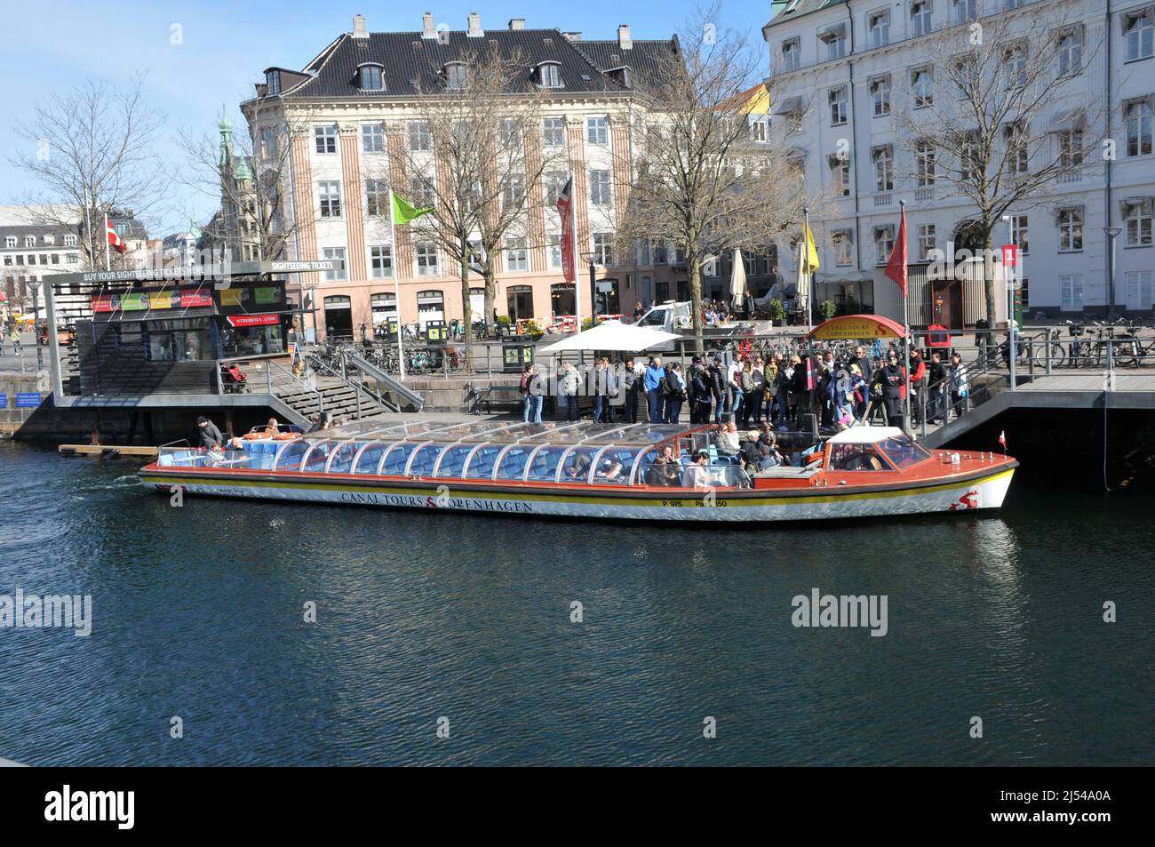 Copenhagen/Denmark/.20 April 2022/.Tourist ready for canal boat cruise ...