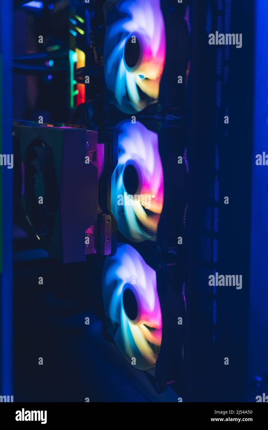 Vertical shot of colorful, rainbow-like professional computer gaming ...