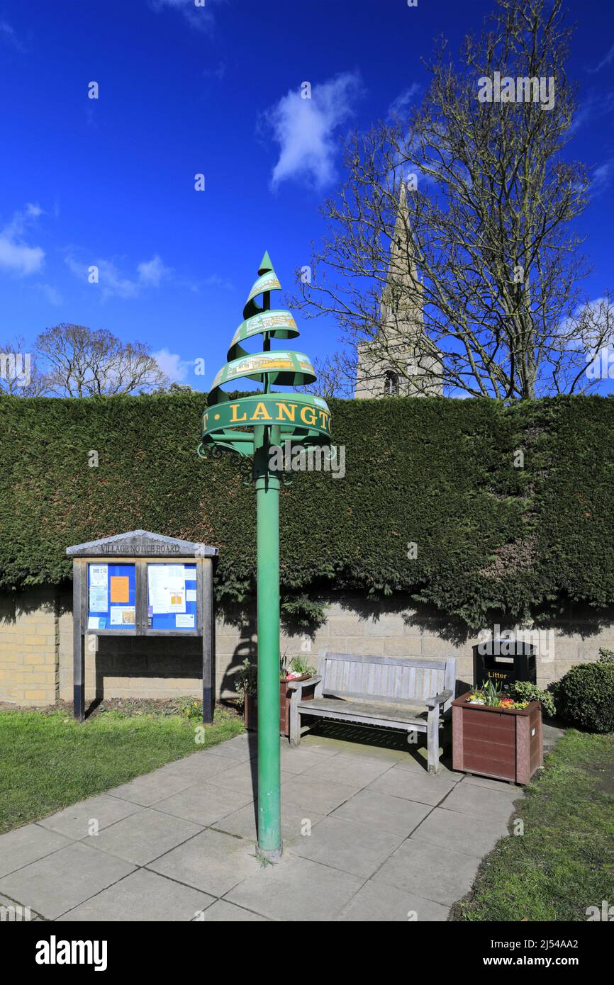 Village sign and St Michaels church, Langtoft village, South Kesteven ...