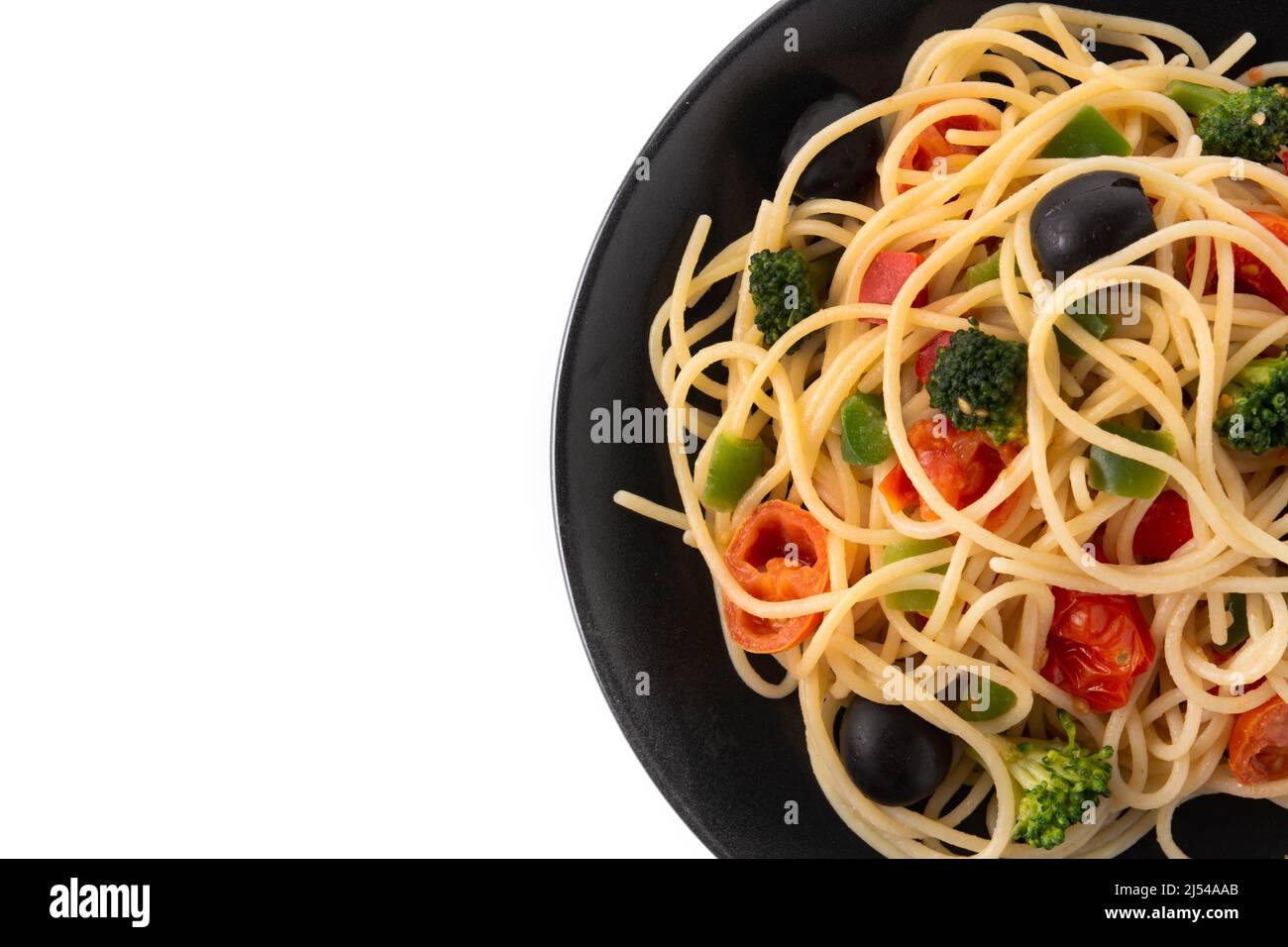 Spaghetti with vegetables(broccoli,tomatoes,peppers) isolated on white ...