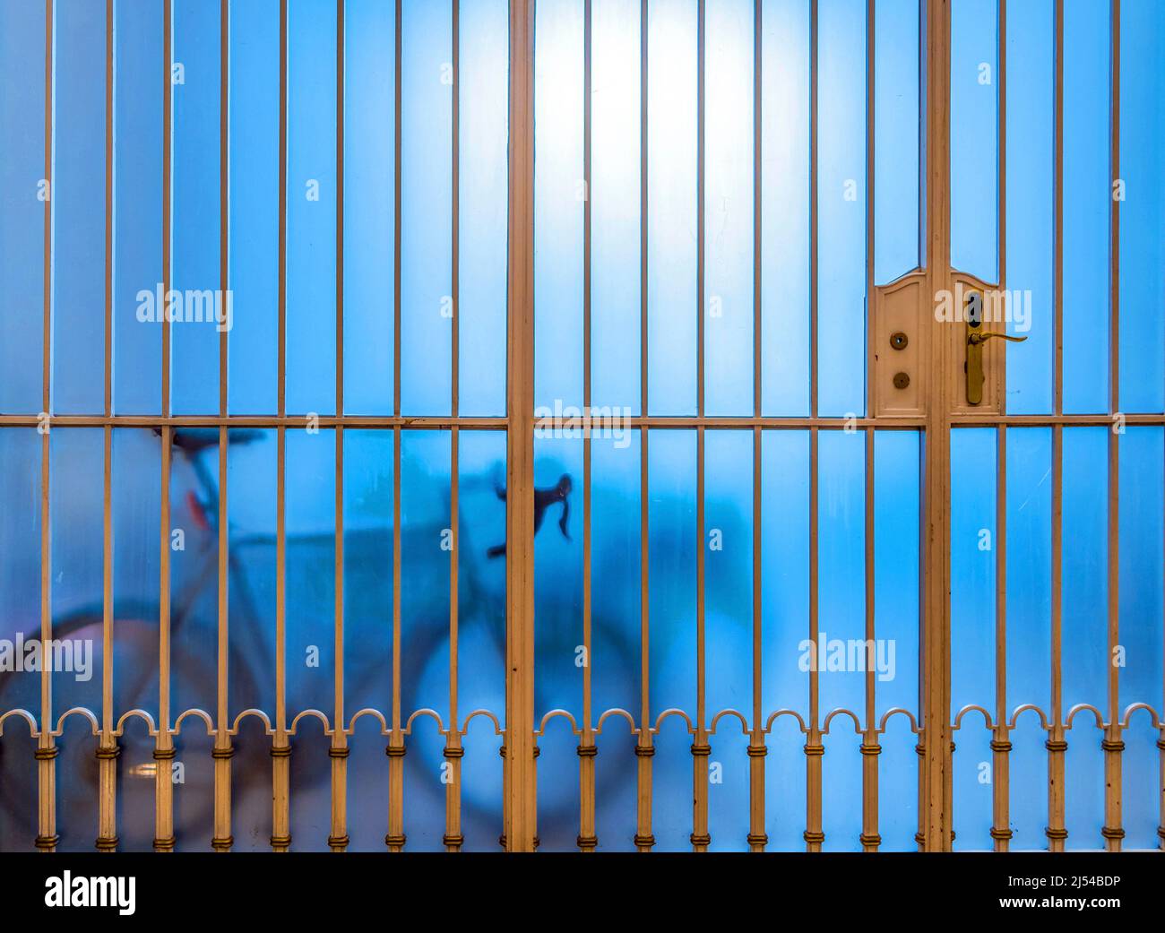 racing bike behind a barred pane of frosted glass, Austria Stock Photo ...