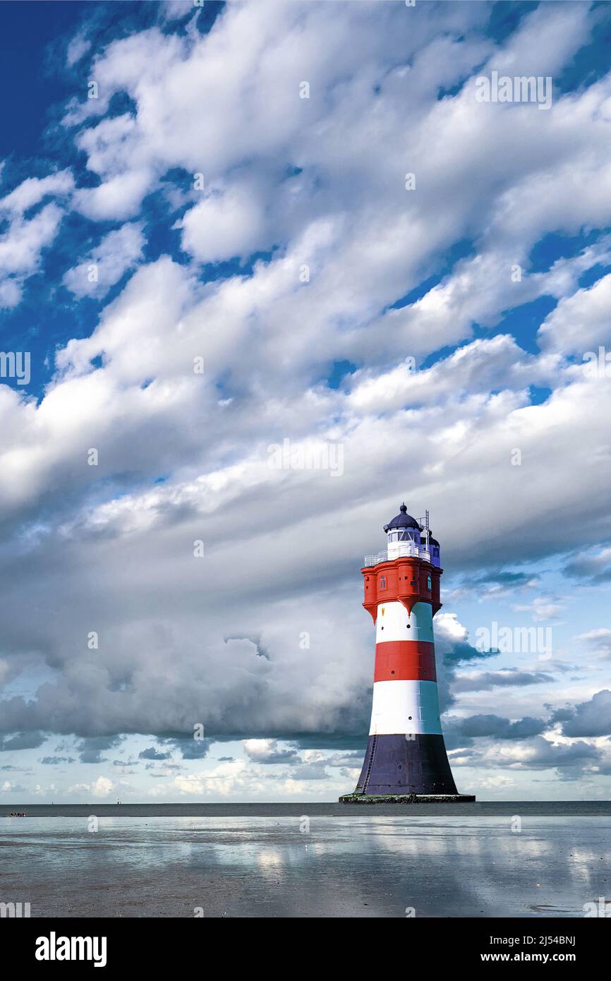 Roter Sand Lighthouse at ebb-tide in the Weser estuary in front of a ...