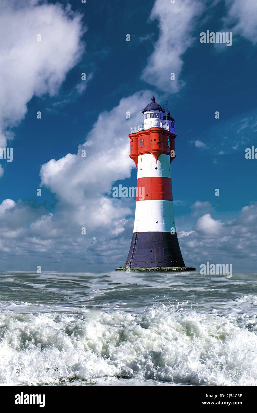 Roter Sand Lighthouse in the Weser estuary in front of a blue sky with ...