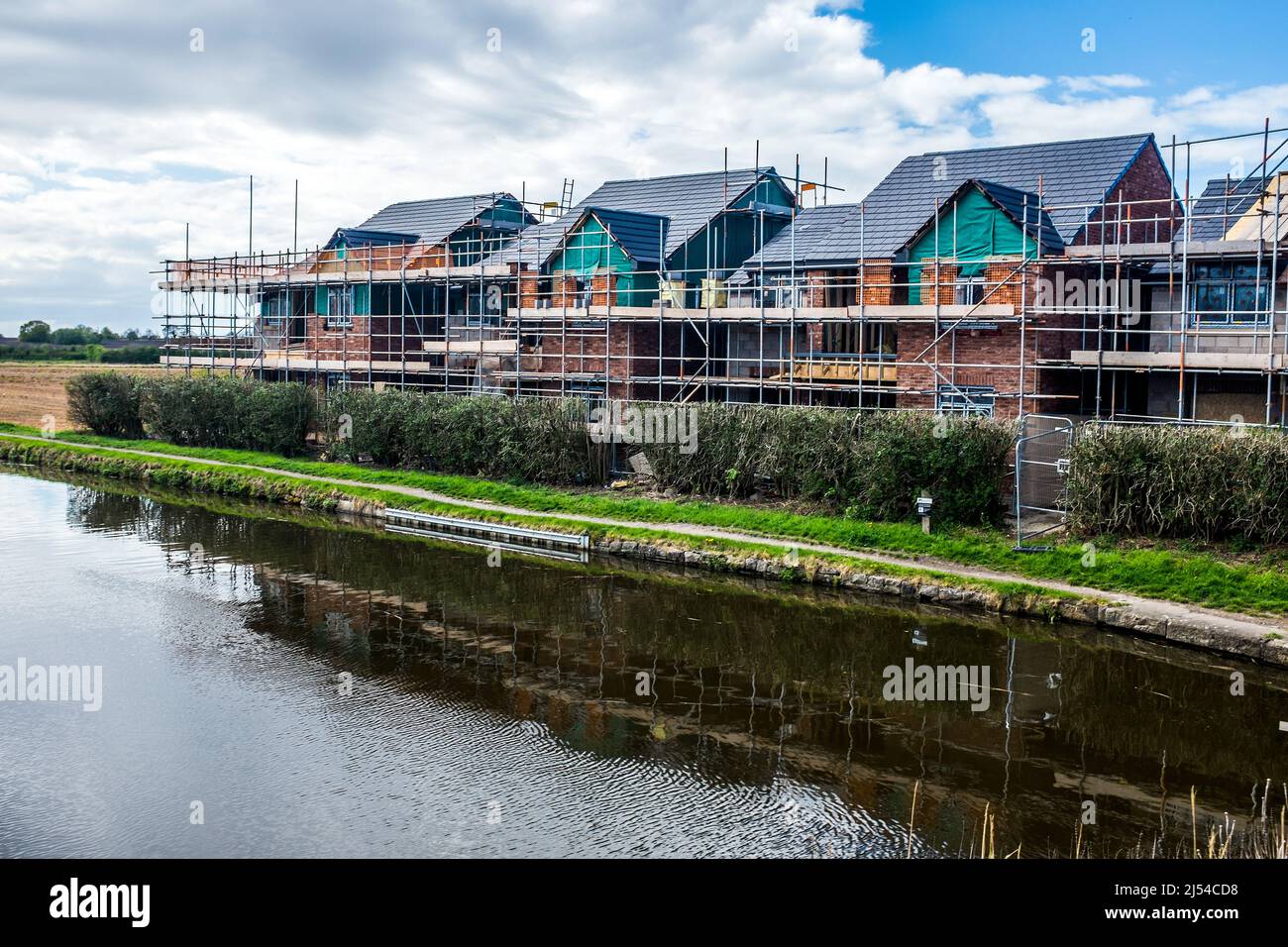 New build houses on a greenfield site Stock Photo - Alamy