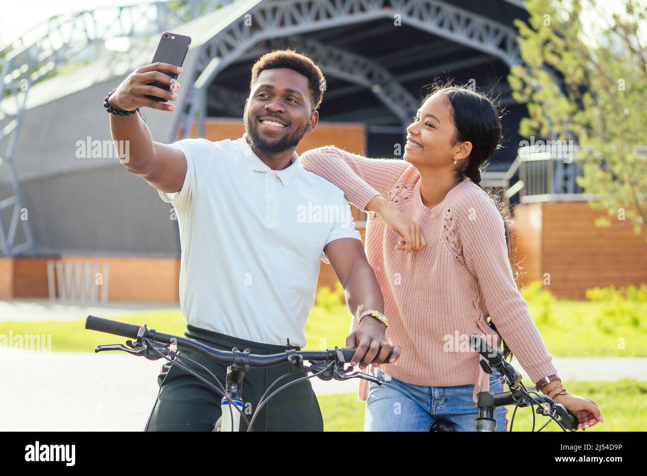 Boyfriend girlfriend cycle together hi-res stock photography and images ...