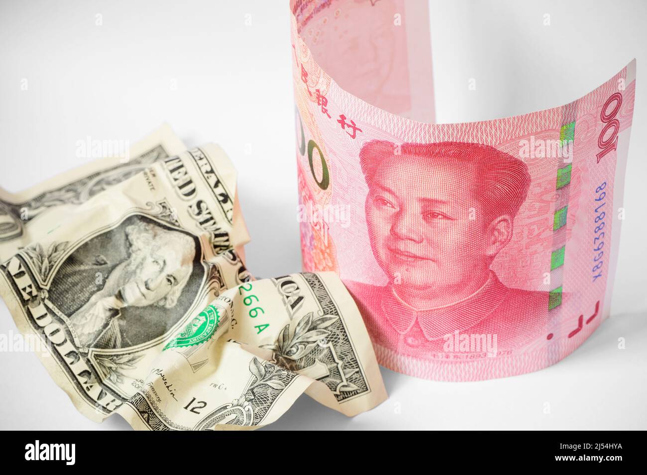 Changing world currency from US dollar to Chinese yuan Stock Photo - Alamy