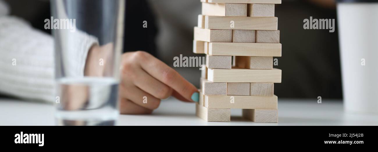 Wooden blocks tower hi-res stock photography and images - Alamy