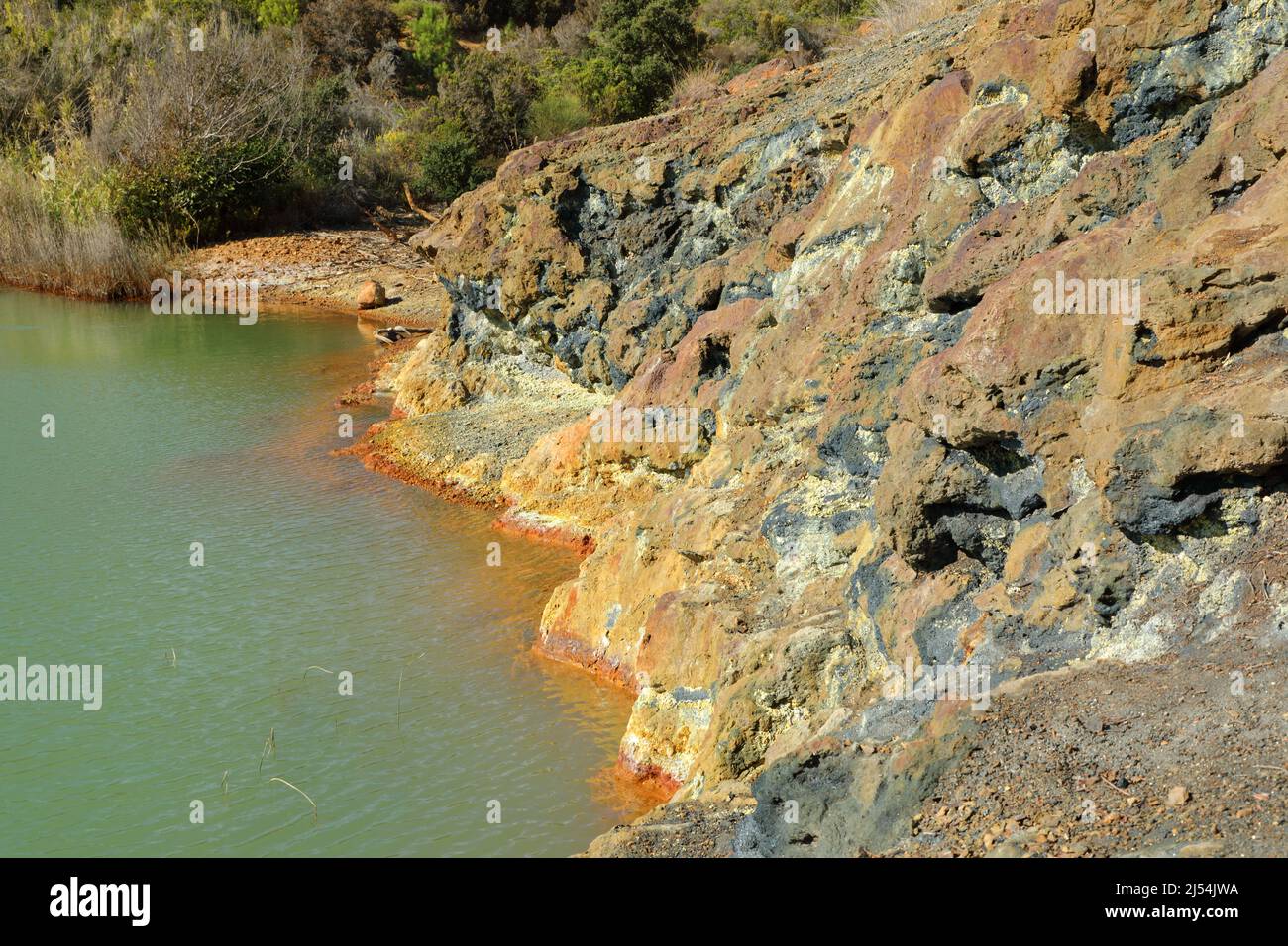Green Terranera sulfuric lake, Elba Island, Italy Stock Photo - Alamy