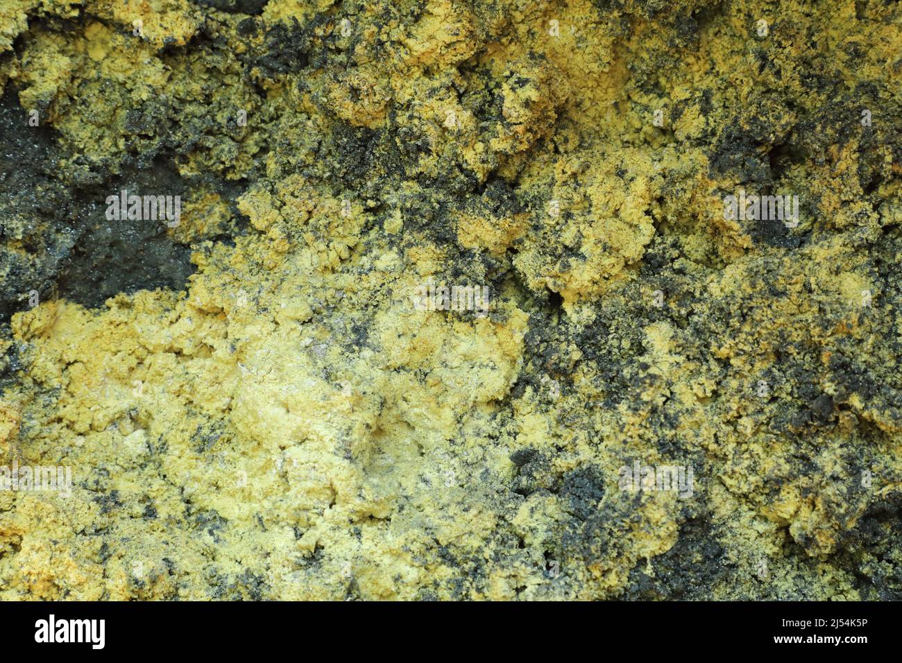 sulfur on stone, native yellow sulfur in nature, mineral structure on ...
