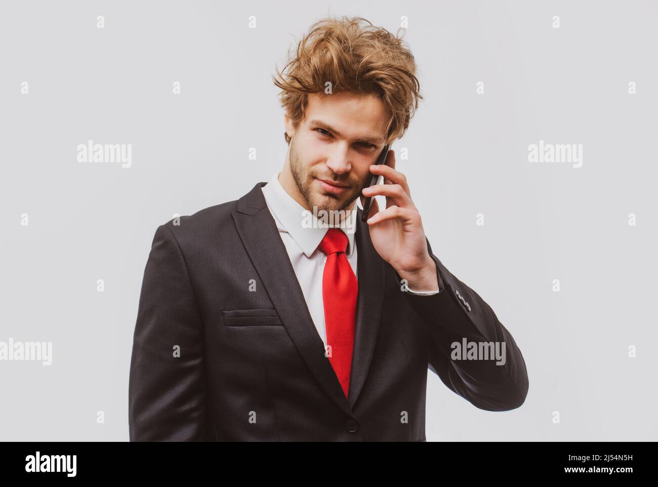 Portrait of man talking on the phone isolated Stock Photo - Alamy