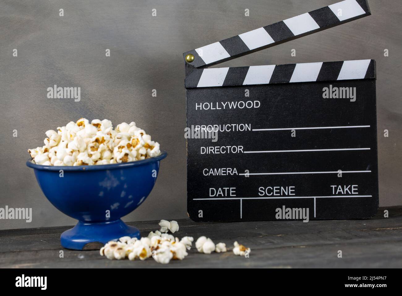Movie Clapper Board and Popcorn Stock Photo - Alamy
