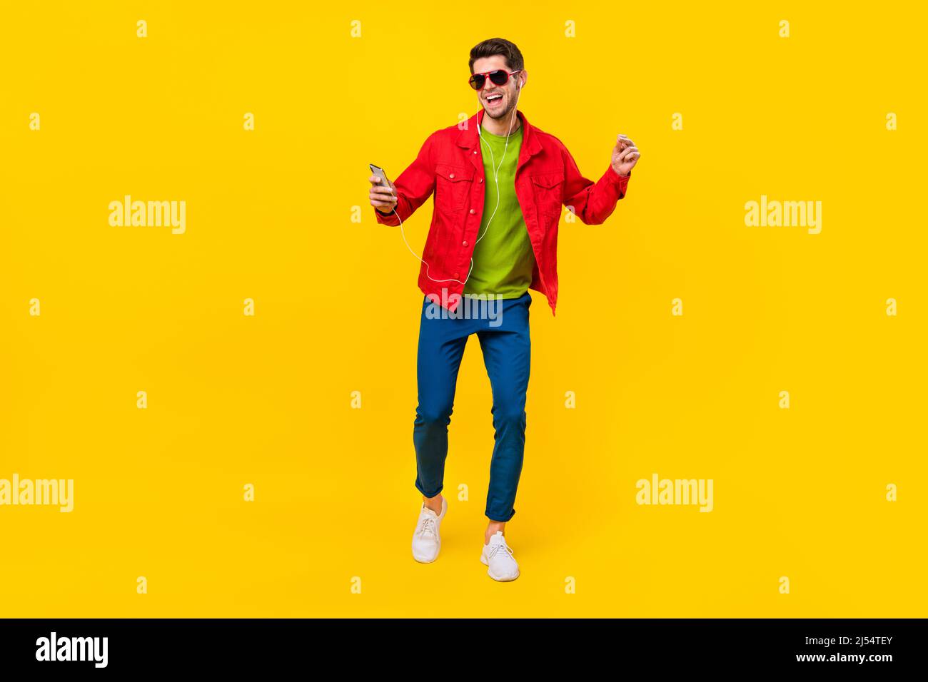 Full body photo of funky young guy dance listen music wear glasses ...