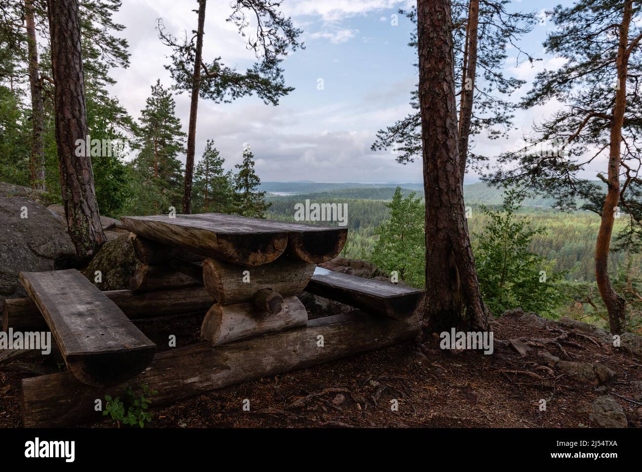 Picnic table and benches at scenic viewpoint in Finland Stock Photo - Alamy