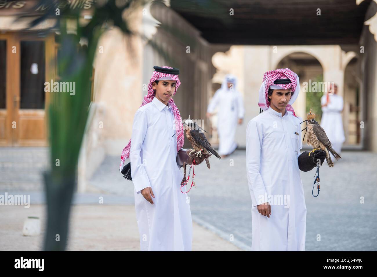 Doha ,Qatar-April 15,2022 : Qatari children with a falcon in the area ...