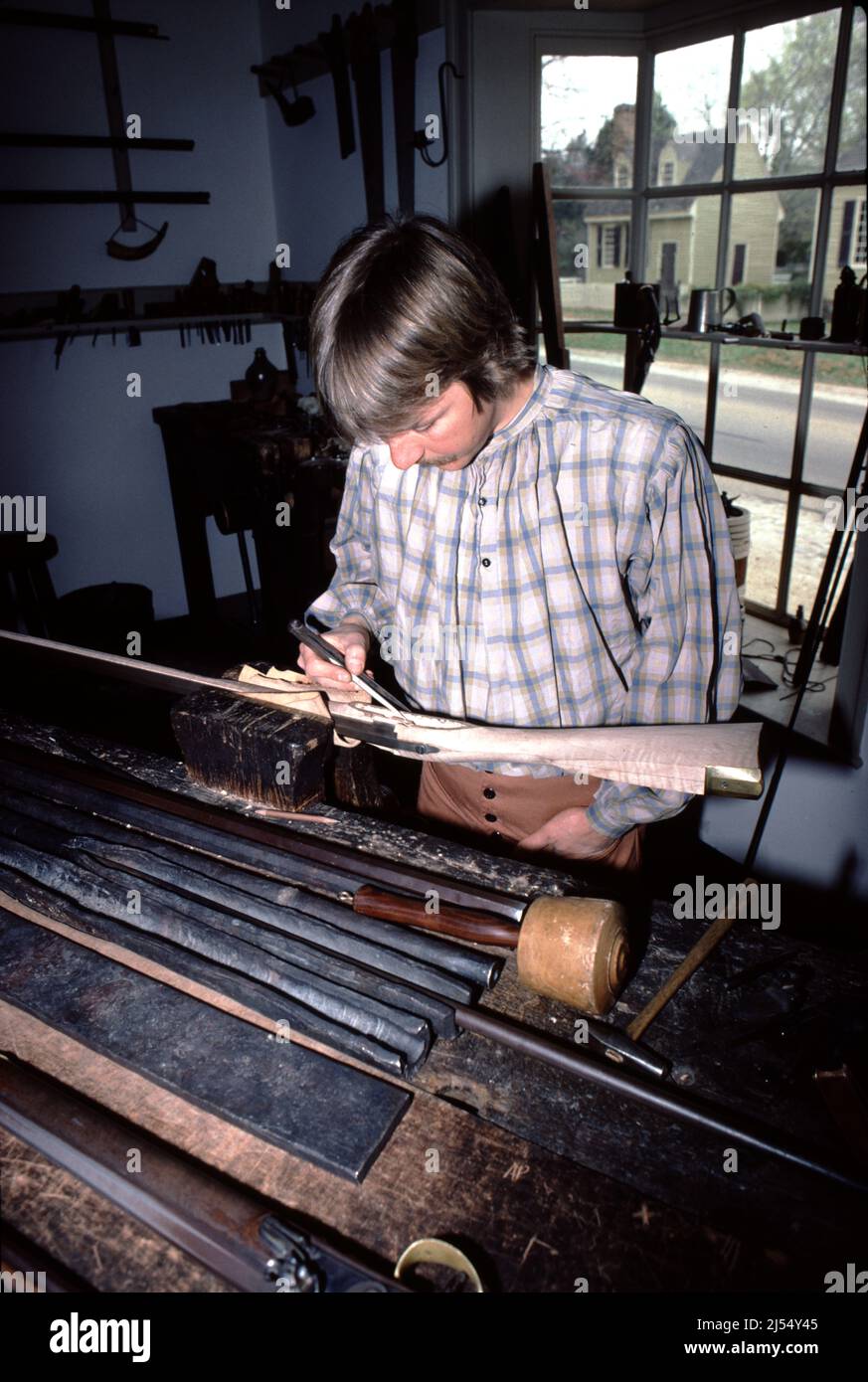 Williamsburg, VA. U.S.A. 9/1987. Master gunsmith for Colonial 18th ...