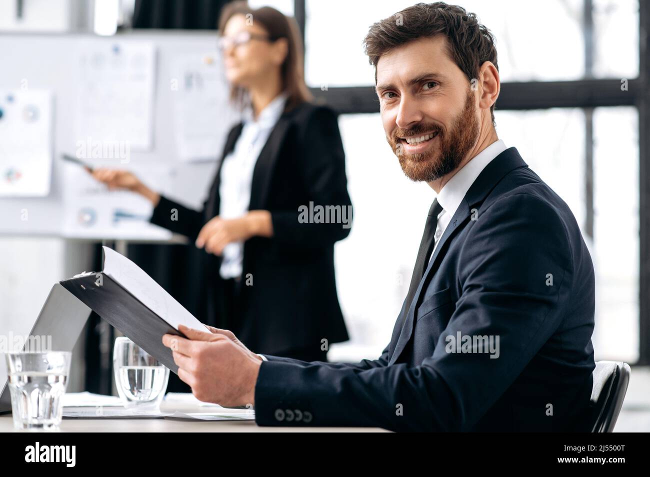Successful business man, company ceo, sits in the office during ...