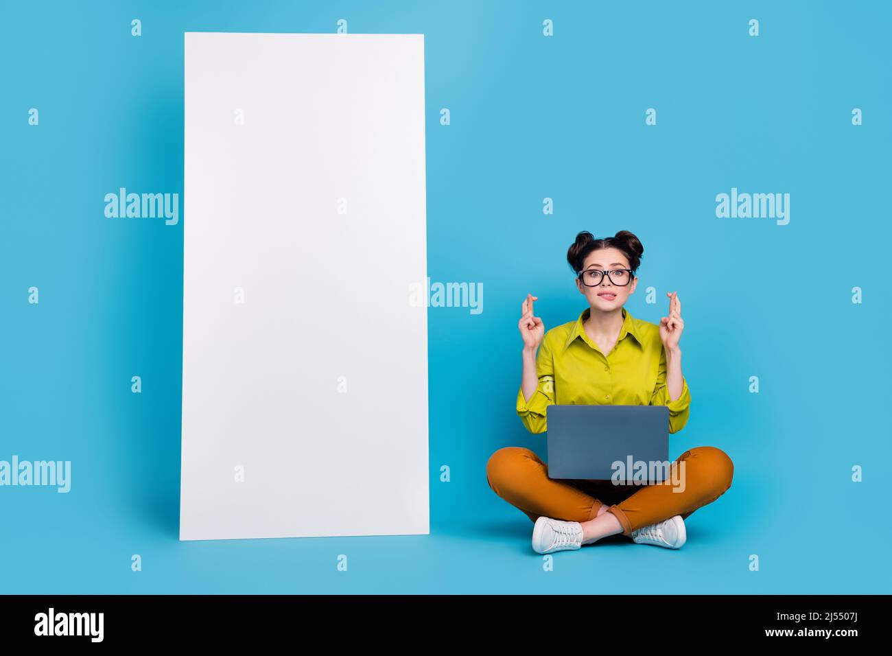 Full body portrait of puzzled lady bite lips crossed fingers big phone ...